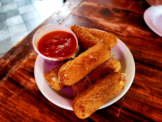 "Where else can you find military memorabilia, vintage paintings, and the perfect chair all under one gloriously cluttered roof?"