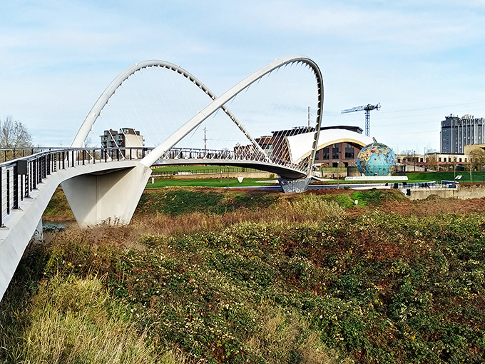 Salem's pedestrian bridge curves gracefully over greenspace, connecting neighborhoods without requiring the navigation skills of a seasoned explorer.