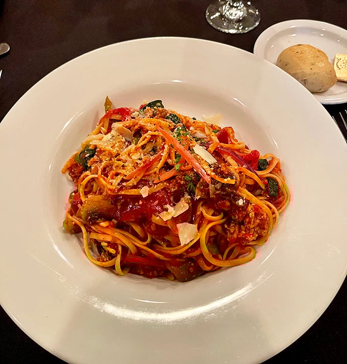 Pasta that would make an Italian grandmother nod in approval. The sauce clings to each strand like it's afraid of abandonment.