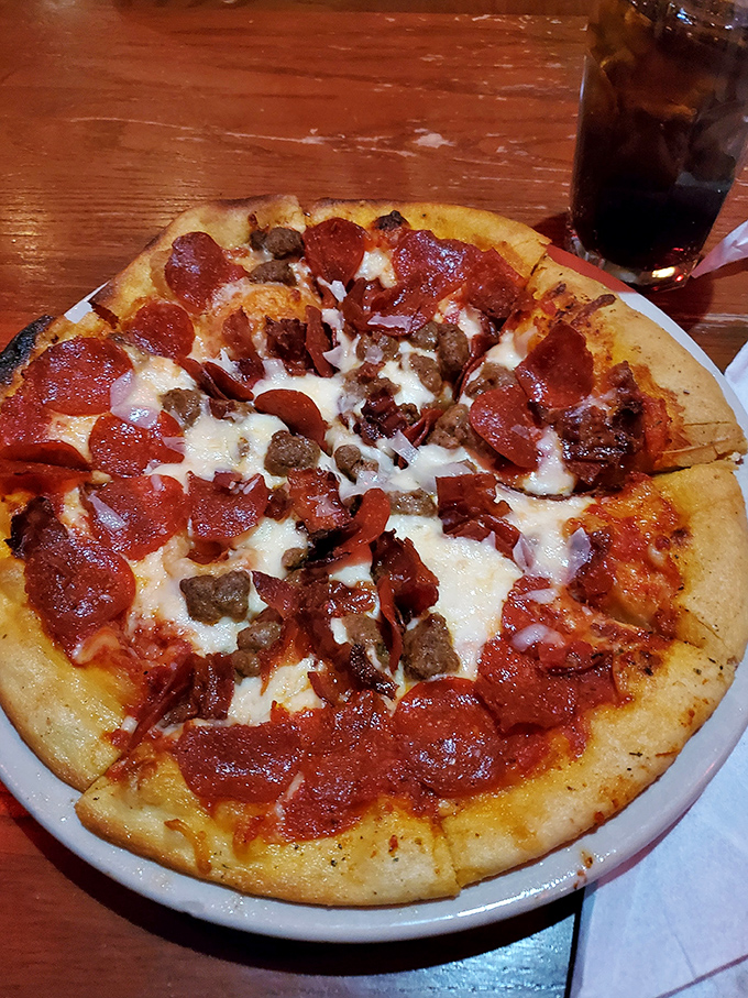 Pizza that makes you question why you ever settled for delivery. The brick oven gives that crust the kind of character development most Netflix shows wish they had.