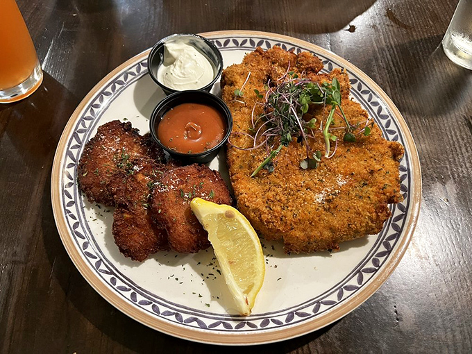 This schnitzel has been pounded thin, breaded, and fried to such golden perfection that Austrian royalty would consider abdicating for a bite.