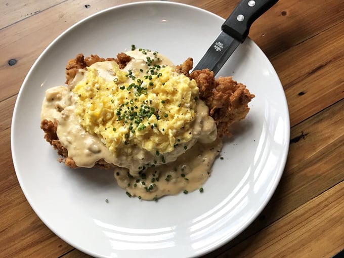 Chicken fried pork under a blanket of gravy with scrambled eggs playing the perfect supporting role. Southern comfort meets Midwestern hospitality.