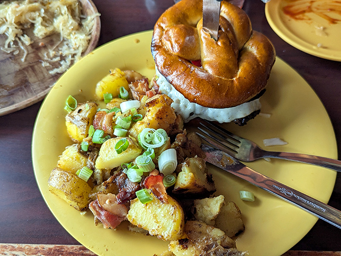 A pretzel crowning German potato salad like edible royalty &ndash; proof that carbs really do go better when paired with more carbs.