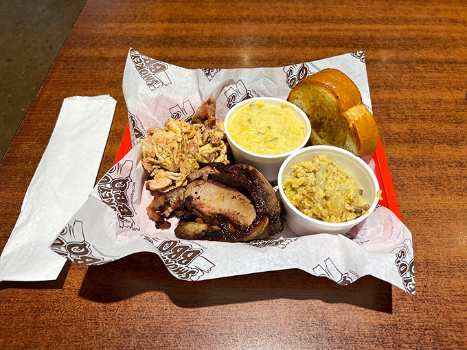 A BBQ sampler that covers all bases &ndash; where smoky brisket and pulled chicken play the most delicious game of one-upmanship.