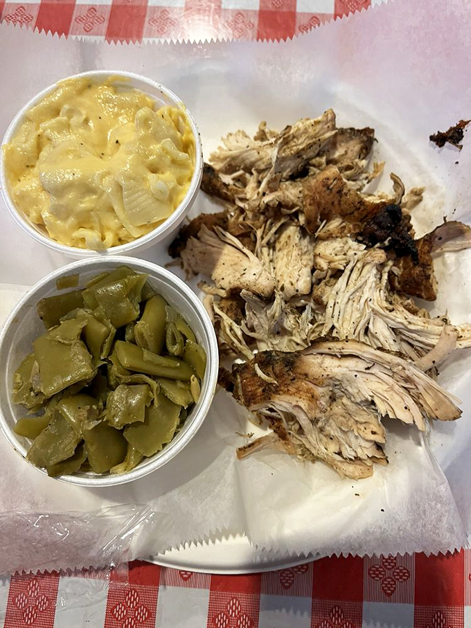 The pulled chicken achieves that elusive barbecue balance&mdash;tender enough to pull apart effortlessly yet maintaining enough texture to remind you it once had ambition.