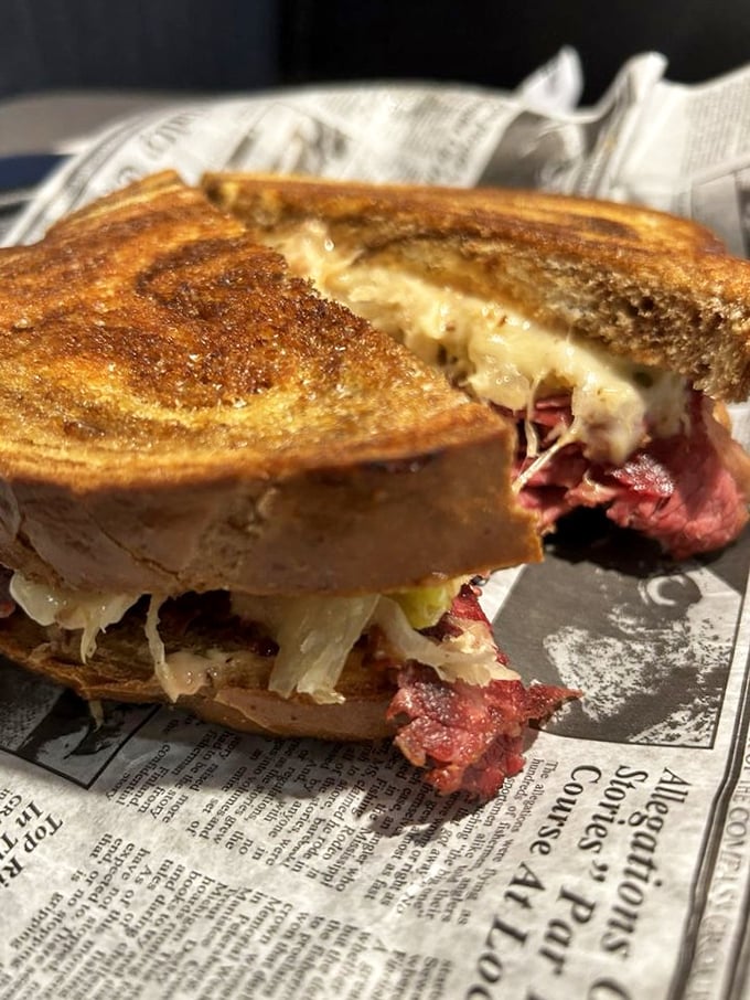 A proper Reuben should require strategic planning before each bite. This beauty, with its melty cheese and perfectly grilled rye, demands your full attention.