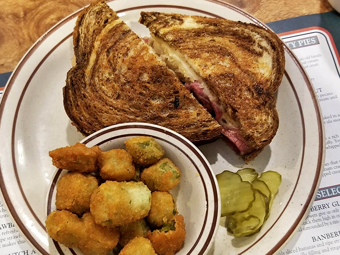 A proper Reuben sandwich with perfectly golden bread&mdash;the kind that makes a satisfying crunch heard 'round the restaurant.