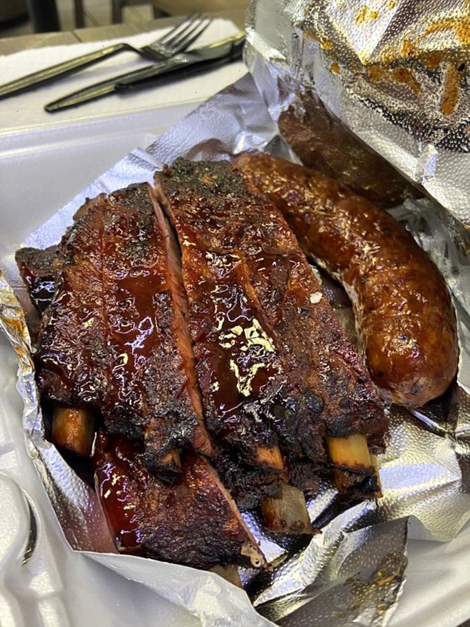 These ribs have that competition-level "kiss the bone" quality&mdash;not falling off, but pulling away clean with each bite. That's barbecue science at work.