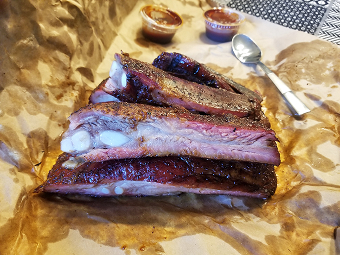 These ribs have the kind of bark that doesn't need a bite&mdash;more like a gentle suggestion before the meat willingly parts from the bone.