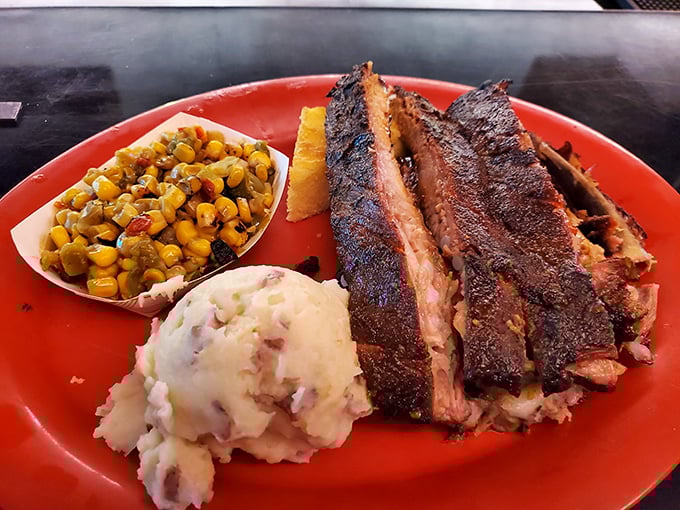 Ribs with that textbook smoke ring and bark that would make a Texas pitmaster tip their hat. Paired with cornbread that walks the sweet-savory tightrope.
