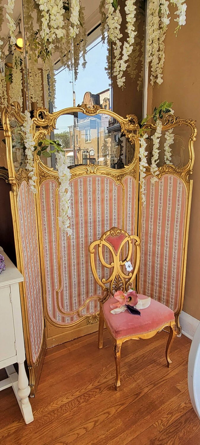 This Louis XV-style room divider doesn't just separate space&mdash;it's theatrical architecture that turns changing clothes into a royal affair.