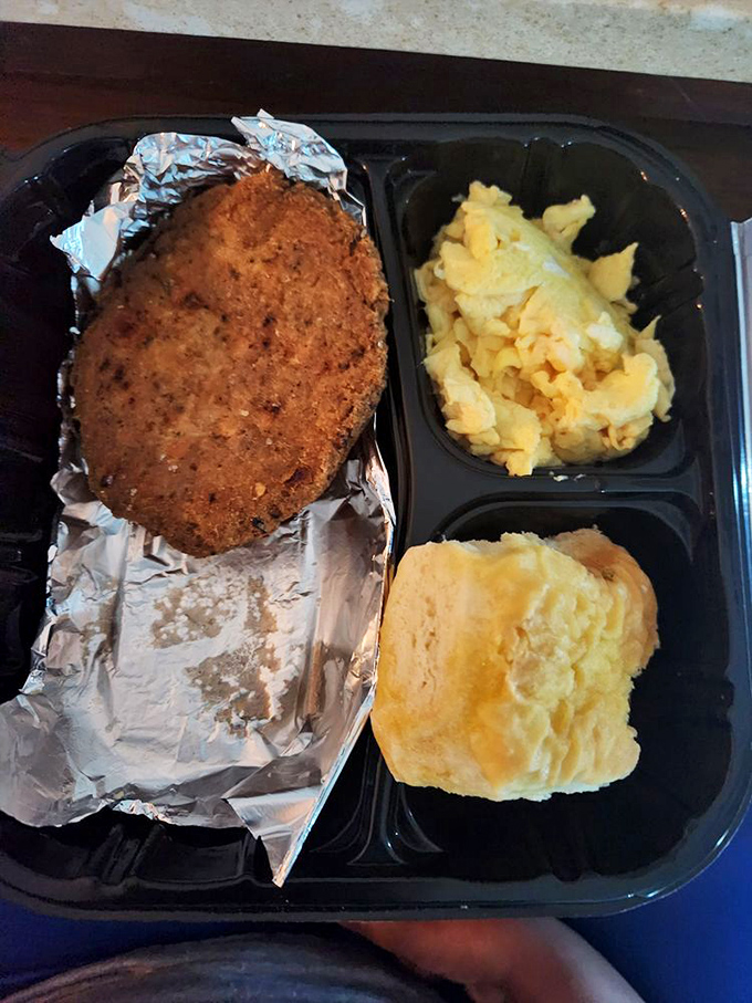 The perfect trifecta: a golden-crusted salmon patty, fluffy potatoes, and a biscuit that could make a Southerner homesick. Soul food harmony.