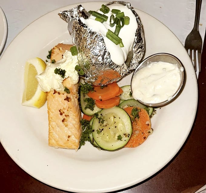 Salmon and vegetables playing nice on a plate that proves seafood in the mountains isn't just possible&mdash;it's downright spectacular.