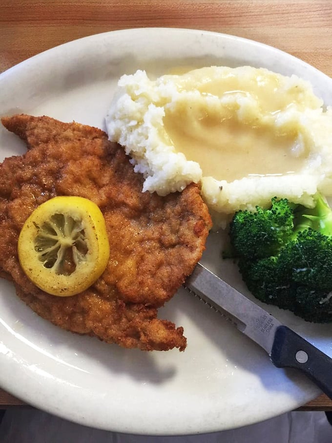 Comfort food that hugs your soul&mdash;golden schnitzel with a squeeze of lemon, creamy mashed potatoes, and broccoli for when your conscience kicks in.