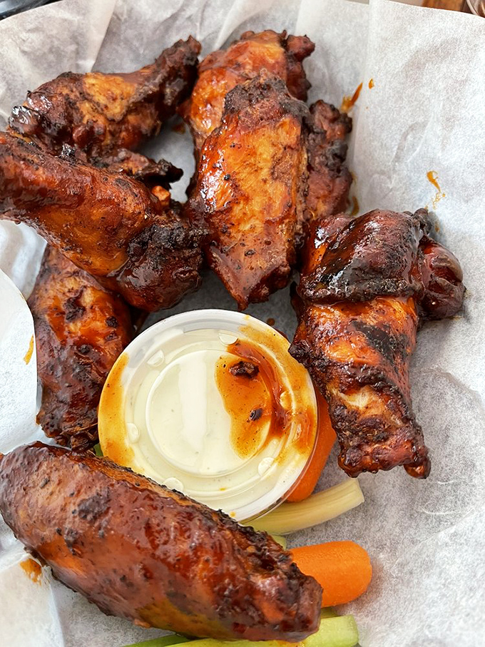 Smoked wings that make Buffalo look basic. These beauties have spent quality time with smoke and fire, developing a complex personality worth knowing.