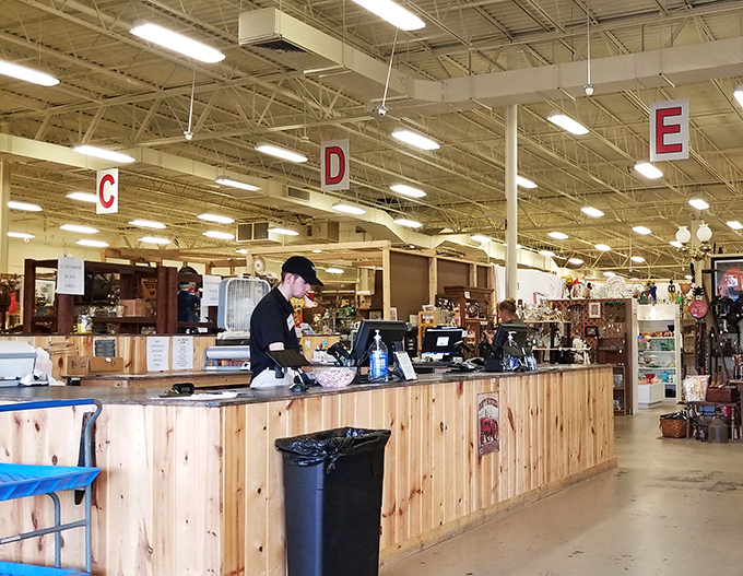 Behind the pine counter, the stewards of this memory museum stand ready to share stories or negotiate that perfect price.