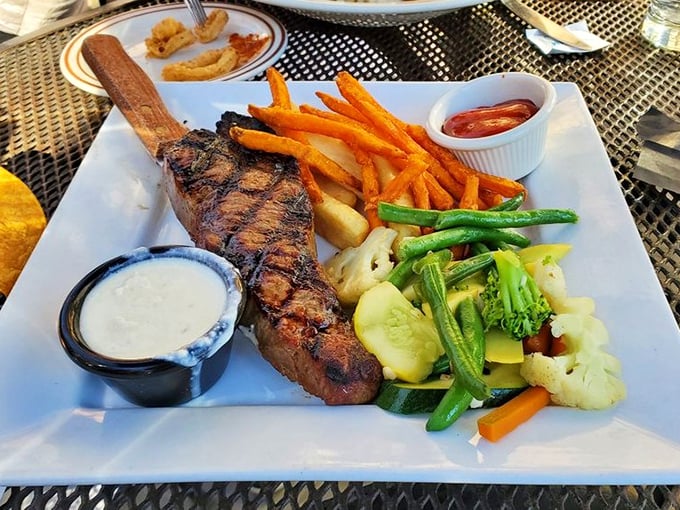 This isn't just a steak &ndash; it's a carnivore's sonnet with vegetables playing colorful backup singers to the star of the show.