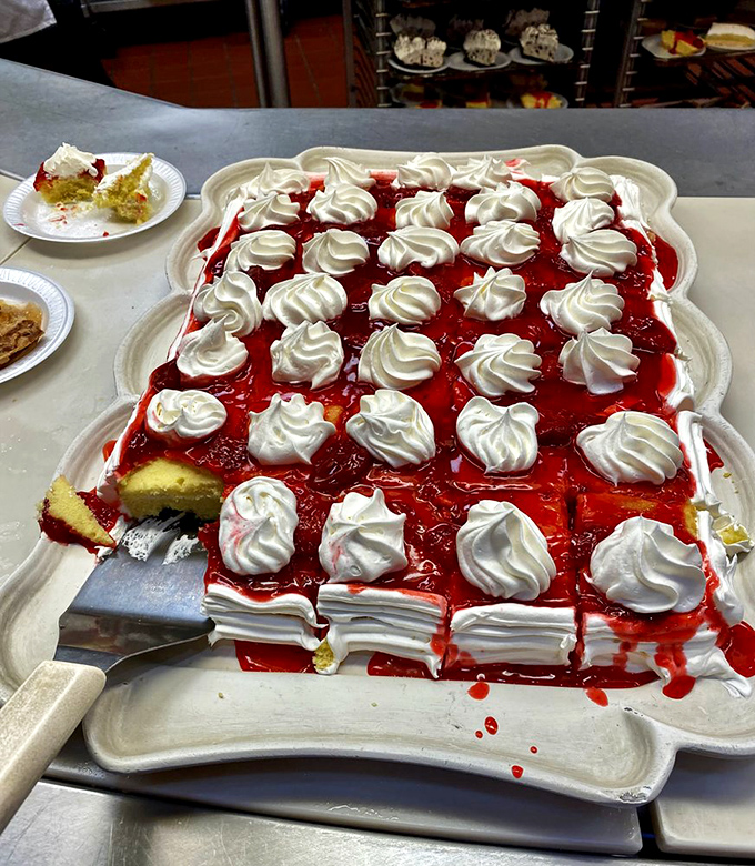 A strawberry shortcake that's practically wearing a whipped cream crown. This isn't just dessert&mdash;it's a celebration with every perfectly piped rosette.