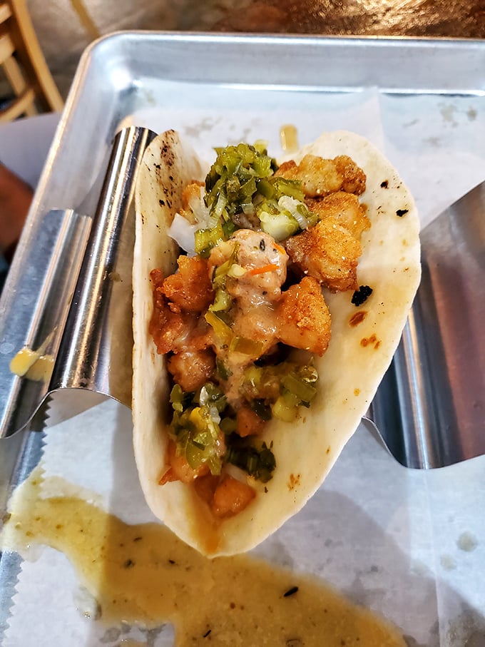 A perfect taco doesn't exi&ndash; oh wait, here it is! Crispy protein, fresh green garnish, and a sauce worth bottling and selling on the black market.