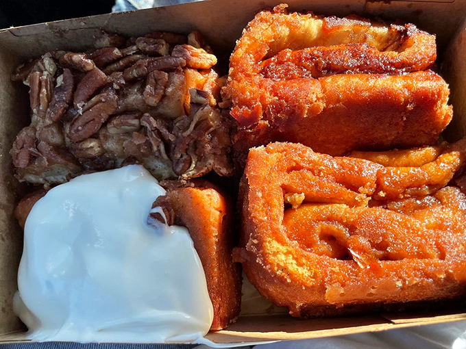 It's a family reunion of cinnamon roll varieties. The pecan and walnut cousins showing off while the original maintains quiet dignity.