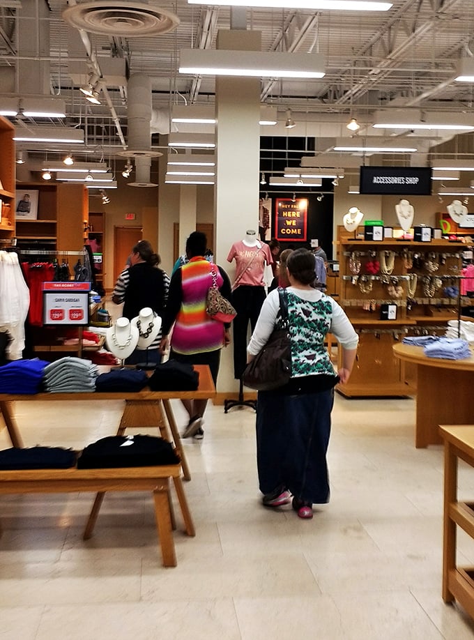 Shoppers navigate the well-designed interior, where the thrill of the hunt is matched only by the satisfaction of finding that perfect item at 60% off.