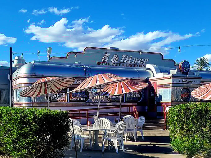 Chrome gleams in the desert sun at 5 & Diner. This silver time machine transports you to burger bliss from decades past.