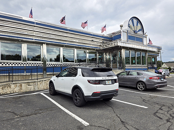 Blue Colony Diner exterior: "Flags flutter above this gleaming chrome landmark&mdash;a patriotic palace where breakfast is served with pride and generous portions."