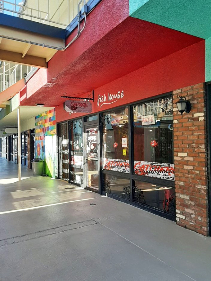 Catcher's Fish House may blend into the strip mall, but one bite of their perfectly fried fish and you'll never miss it again!