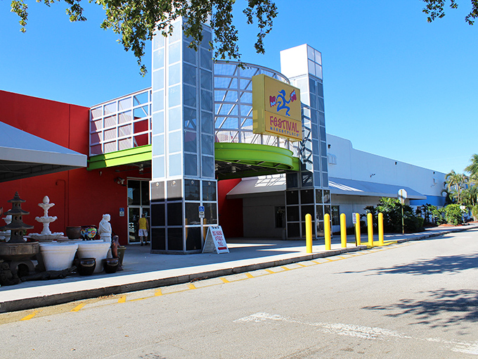 Modern mall meets bargain bazaar! Festival Marketplace's colorful exterior invites you into a world of air-conditioned treasures.