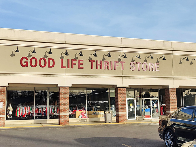 Good Life Thrift Store's welcoming façade hints at the organized chaos of treasures within. Those black lamps add a touch of retail elegance!