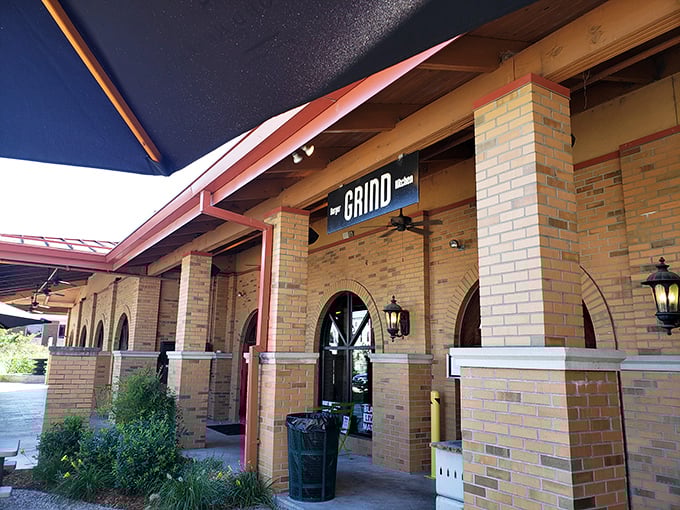 Grind's brick arches and lanterns create the perfect setting for a burger that's dressed up but still knows how to have fun.