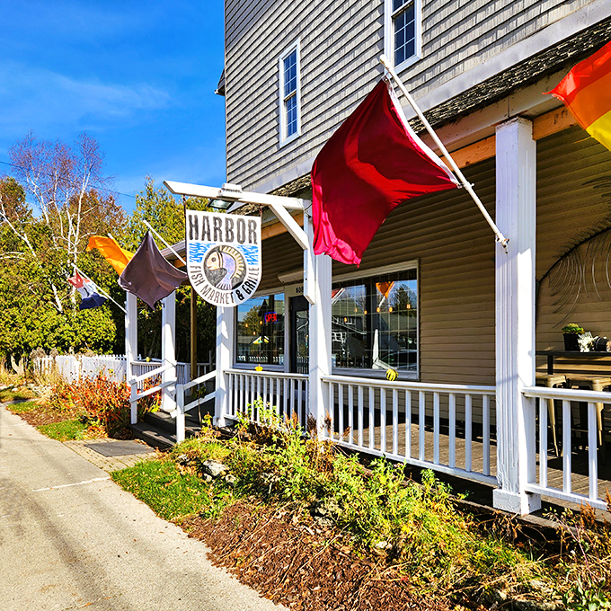 Harbor Fish Market's charming facade and colorful flags create that "we've arrived" moment every road trip needs. Door County seafood at its finest!