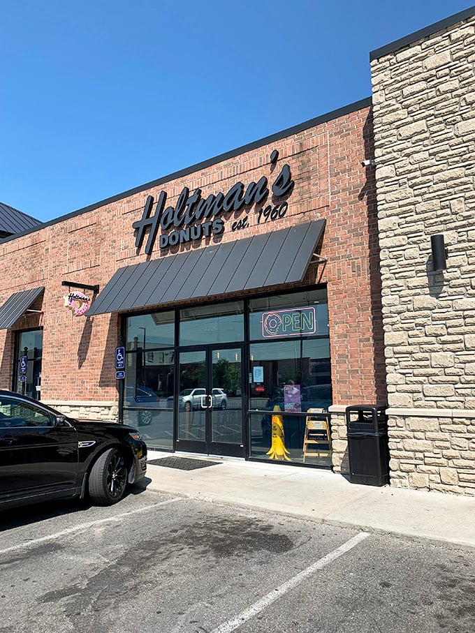 Holtman's modern brick exterior houses old-school donut magic. Like finding an iPhone that can also make perfect toast.