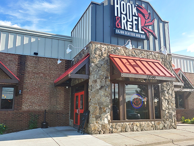 Hook & Reel's stone fa&ccedil;ade and bold signage promises a Cajun seafood adventure that'll transport you straight to Louisiana.
