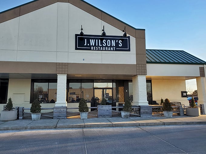 J. Wilson's modern fa&ccedil;ade suggests what awaits inside: steak tradition elevated through contemporary craftsmanship.