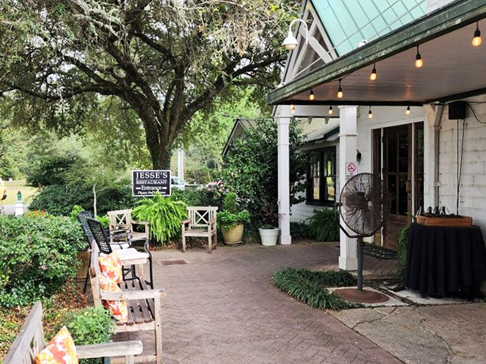 Jesse's charming porch and lush greenery create the perfect Southern welcome - like a warm hug before the meal even begins.