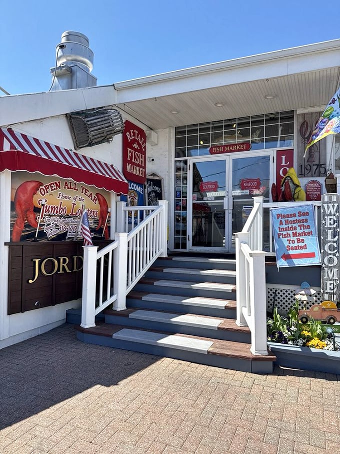 Jordan's welcoming entrance promises jumbo lobster treasures within. That red awning is like a runway light guiding seafood pilots home.