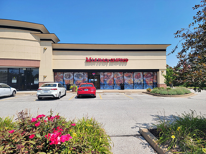 LA Juicy Seafood's storefront might be modest, but those glowing red letters promise seafood adventures. Plastic gloves not pictured but definitely required!