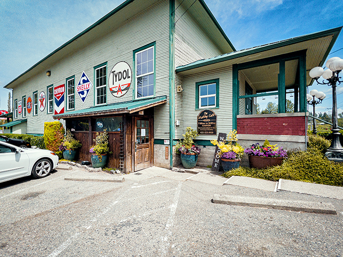 Those vintage gas signs aren't just decoration &ndash; they're fueling up your appetite for what waits inside this historic schoolhouse.