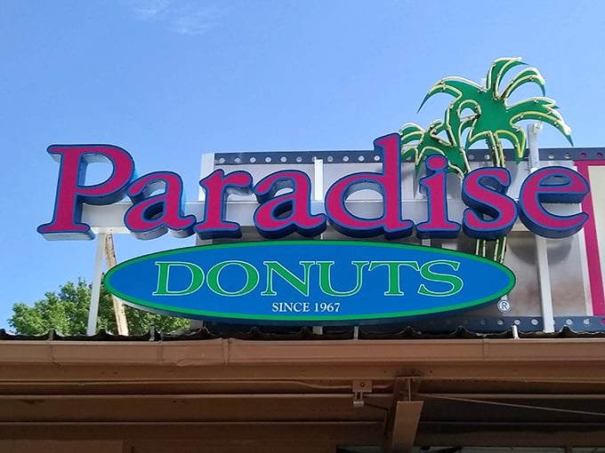 Paradise Donuts' sign promises exactly what it delivers&mdash;a tropical vacation for your taste buds in the heart of Kansas.
