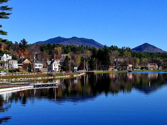 Saranac Lake nestles perfectly against the Adirondack Mountains, offering views that no Instagram filter could possibly improve.
