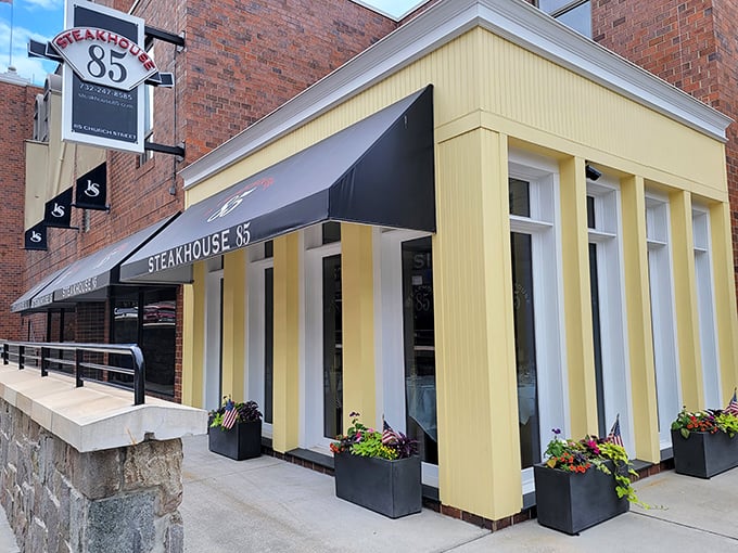 Steakhouse 85's bright yellow exterior stands out in New Brunswick like a perfectly seared steak on a white plate.