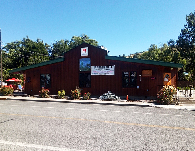 Wooden wonder with a side of sizzle! This charming spot looks like it wandered right out of a Western, bringing the best steaks along for the ride.