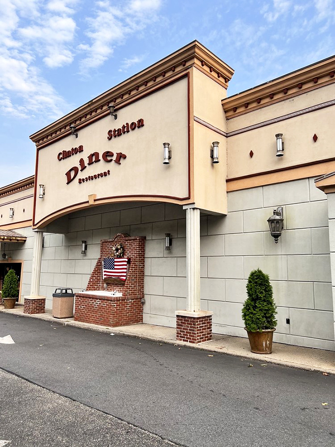 Clinton Station Diner's warm exterior welcomes you like an old friend, with the American flag proudly announcing this is classic Americana at its finest.