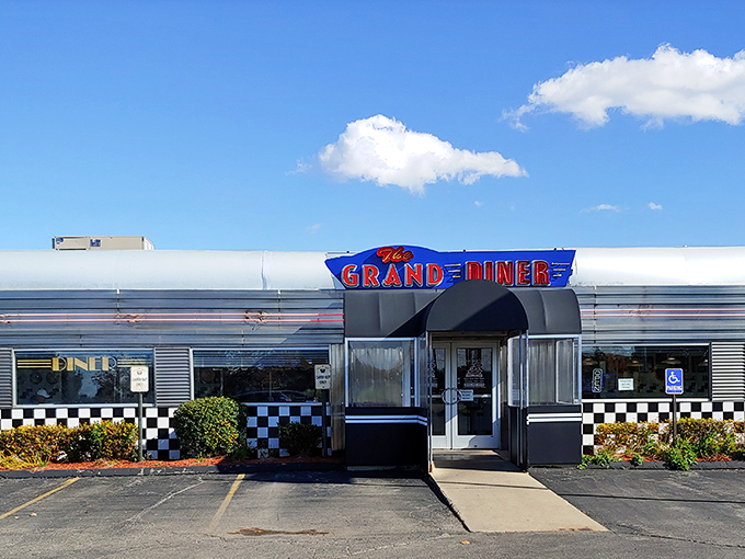 The Grand Diner's classic silver exterior gleams like a time machine ready to transport you to an era when breakfast was an art form.