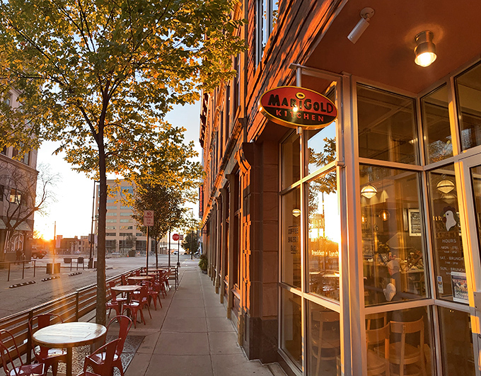 The Marigold Kitchen's warm glow at sunset invites you to imagine tomorrow's breakfast possibilities while you're still digesting dinner.