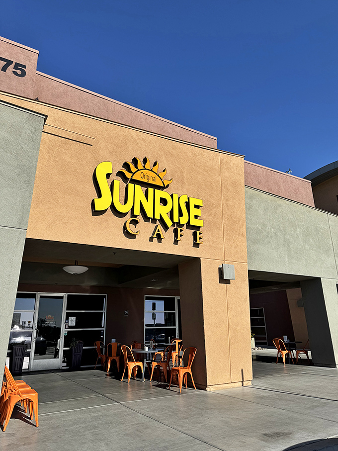 Sunrise Cafe's golden signage promises morning glory – where breakfast is served with a side of Nevada sunshine.