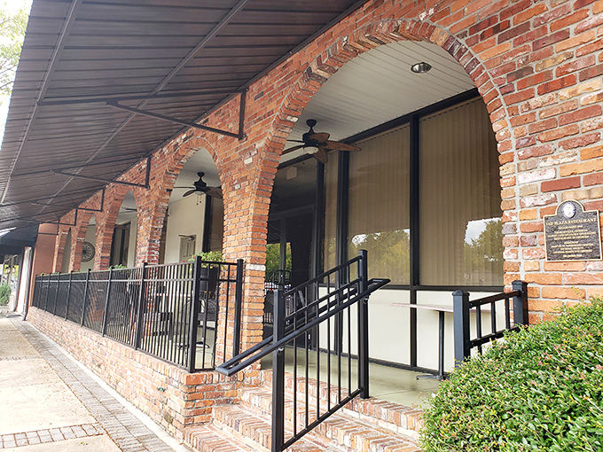 The Plaza's classic brick arches have welcomed generations of Thomasville diners seeking steak perfection.