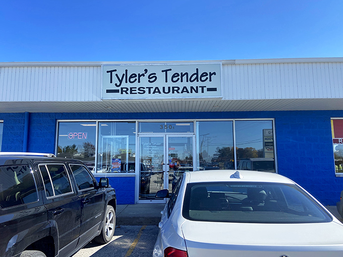 Tyler's Tender's bright blue façade signals you've arrived at a train lover's dream dining destination.