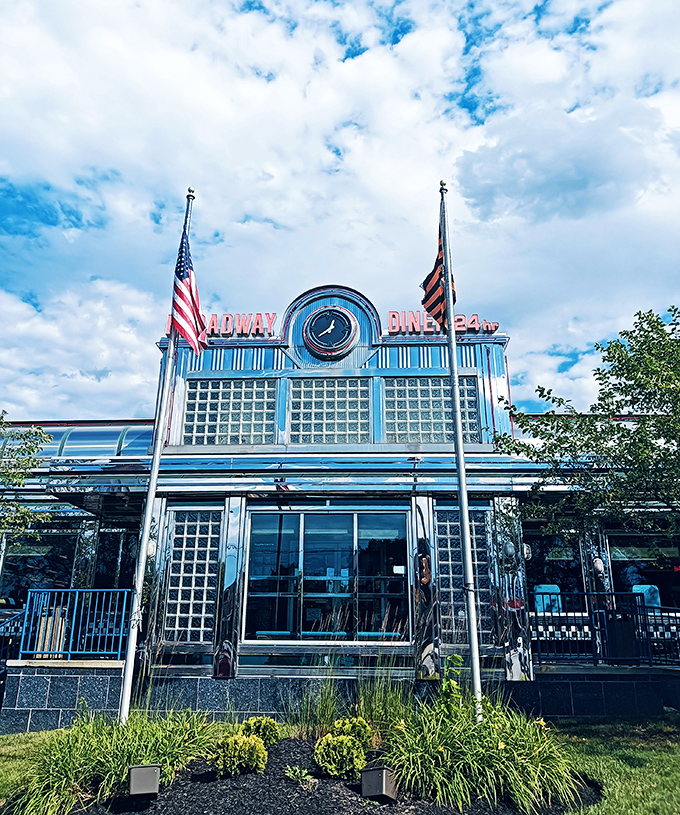 With its classic diner silhouette and proud American flags, Broadway stands as a chrome-plated monument to breakfast democracy.